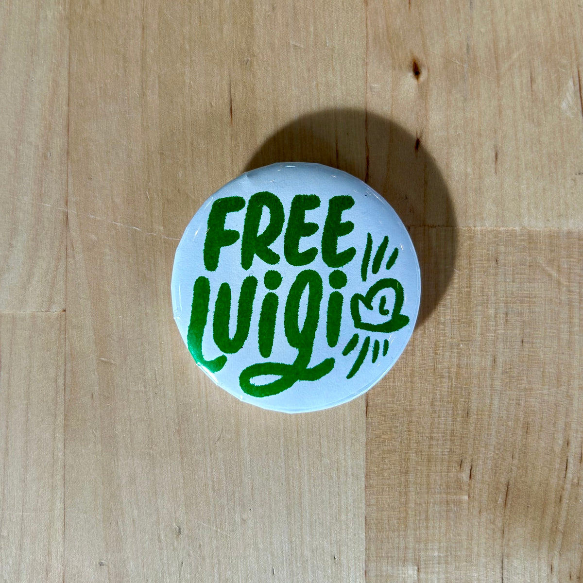 Free Luigi Button – Bench Pressed Letterpress